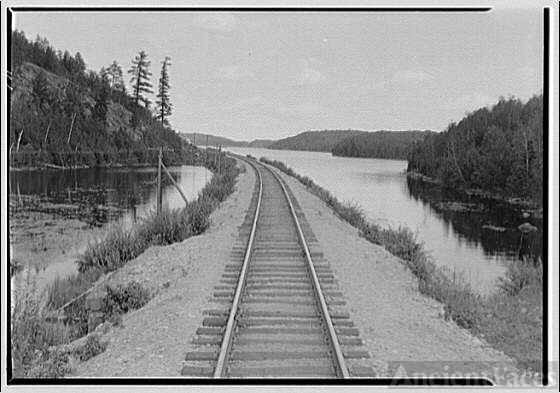 Canadian scenes. Railroad track between two bodies of water