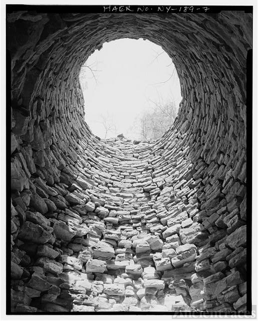 7. INTERIOR VIEW UP THE INSIDE OF THE FURNACE STACK.