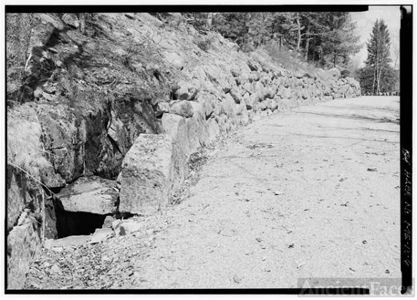 6. DROP CULVERT AND RUSTIC RETAINING WALL FACING ESE...