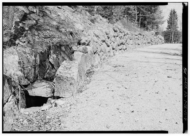 6. DROP CULVERT AND RUSTIC RETAINING WALL FACING ESE...