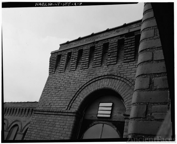 8. CLOSE UP VIEW OF CORBELING AND ROMANESQUE WINDOW ARCH...