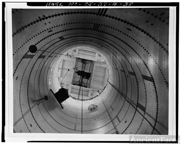 38. INTERIOR VIEW OF TANK. Suspended wooden platform...