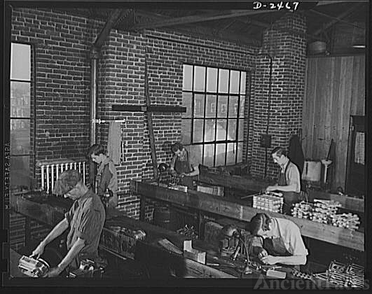 Conversion. Floor waxer plant. These bench operators of a...