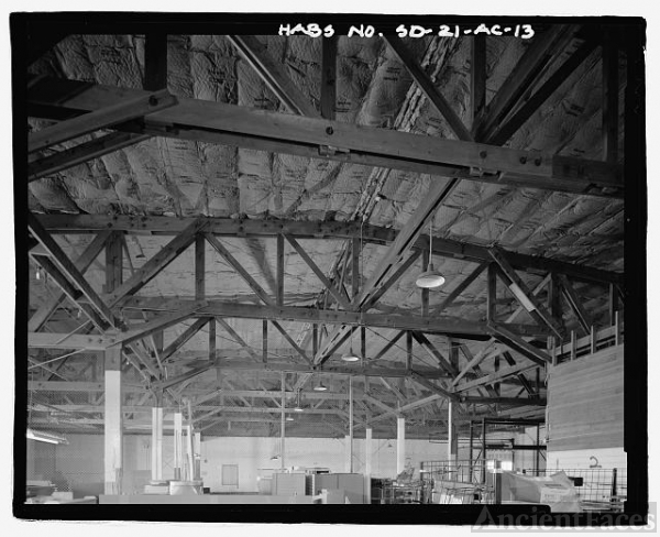 13. Interior ceiling of warehouse showing truss...