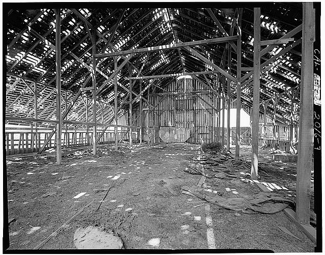 7. FEED BARN (STRUCTURE 1) INTERIOR VIEW OF MOW AREA