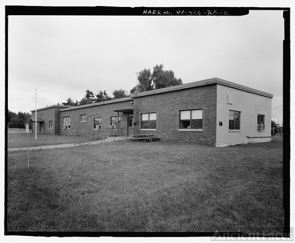 WEST (FRONT) AND SOUTH (SIDE) ELEVATIONS OF BUILDING....
