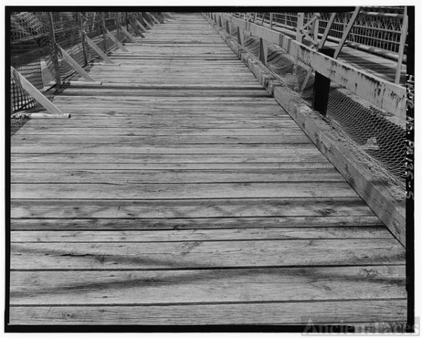 5. DETAIL OF WOODEN BRIDGE DECK, FACING NORTH. - Brown...