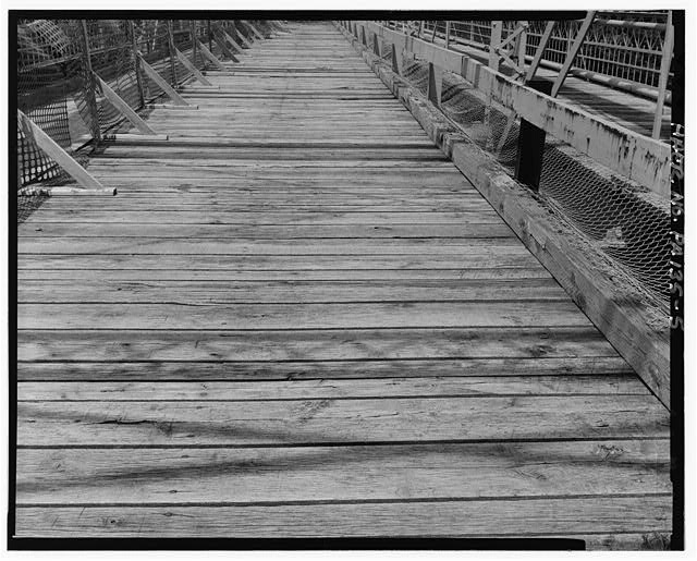 5. DETAIL OF WOODEN BRIDGE DECK, FACING NORTH. - Brown...