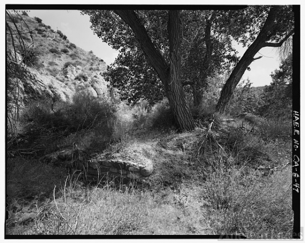 47. COBBLE WALL ABOVE UNDERGROUND WATER CHANNEL. - Little...