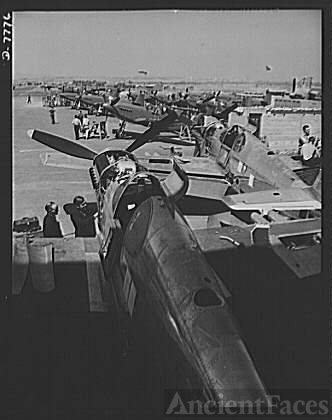 Production. P-51 ("Mustang) fighter planes. A partial...