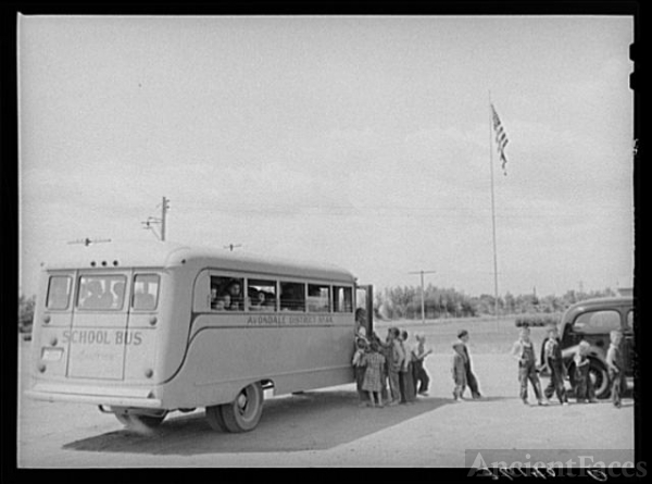 School bus bringing home children to Agua Fria migratory...