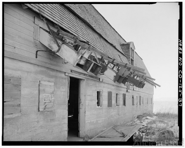 Barn, exterior detail, chutes, left side of building.