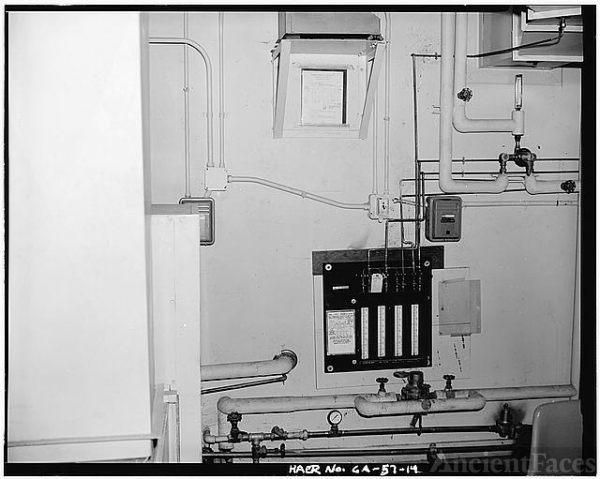 14. INSIDE VIEW OF BOMB SHELTER WITH AIR COMPRESSOR...