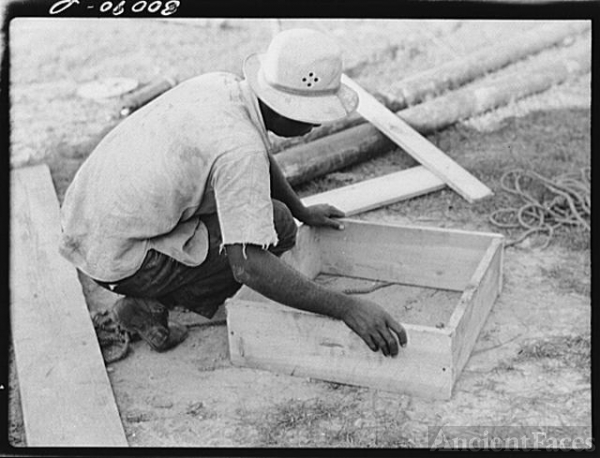 Form for pouring concrete cap for culvert pipe. Safe well...