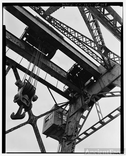 8. Detail view of underside of crane with hoist hooks and...