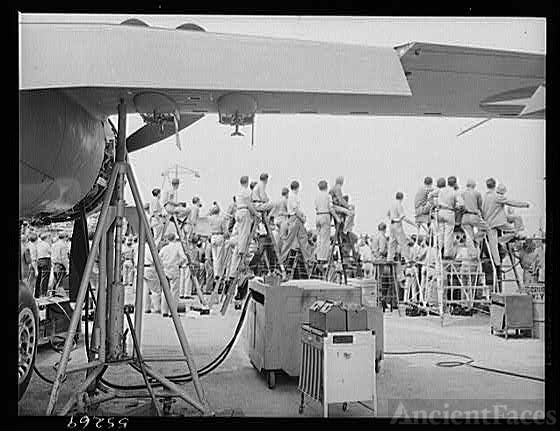 North American employees gather on the flight ramp during...