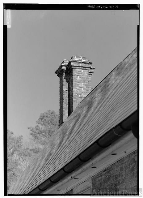 9. Close view of the T-shaped chimney stack on the north...