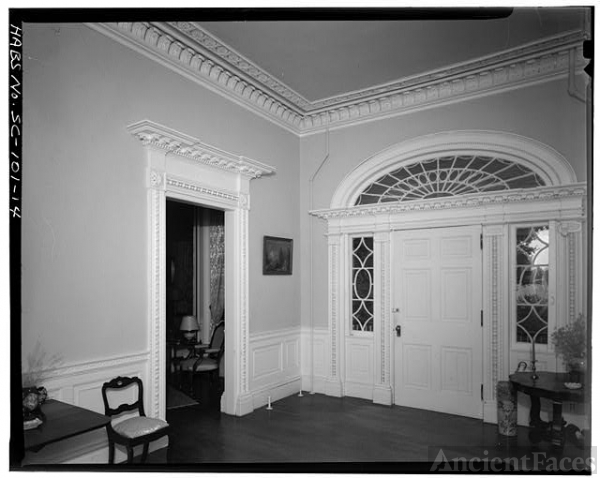 14. FIRST FLOOR HALL, LOOKING SOUTHEAST. The door leads...