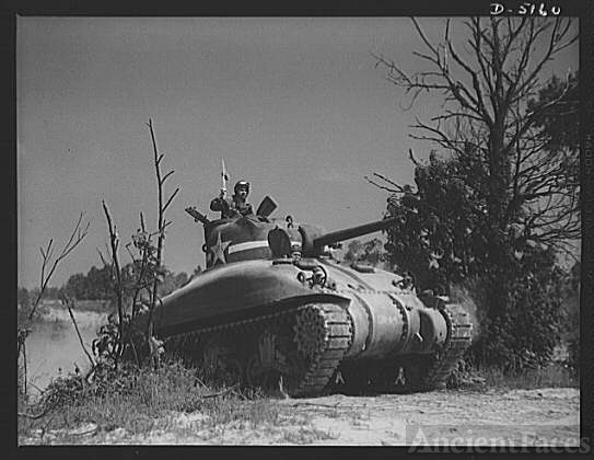Fort Knox. M-4 tanks and crews. In the massive cast-steel...