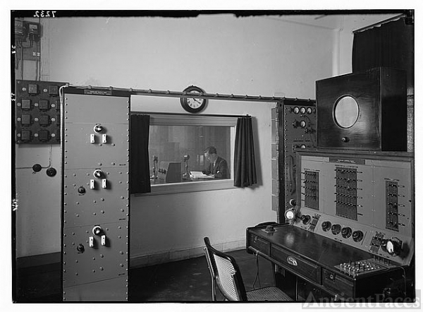 Radio studio. Controll [sic] room. Looking into studio