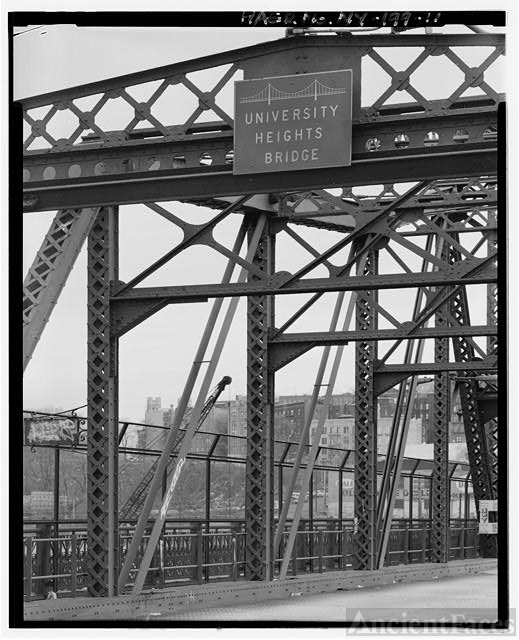 11. Detailed view of sign, portal strut, lattice work,...