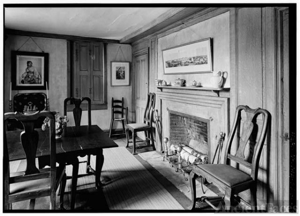 7. FIREPLACE AND SHUTTERED WINDOW IN FIRST-FLOOR...