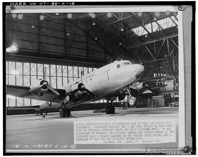 18. C-54G AIRCRAFT IN HANGAR. Photographic copy of...
