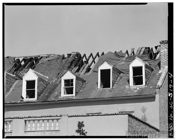 4. ROOF FRAMING EXPOSED AFTER 1978 FIRE. NOTE ROOF...