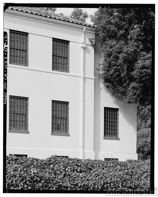 Detail of first and second floor windows at east corner...