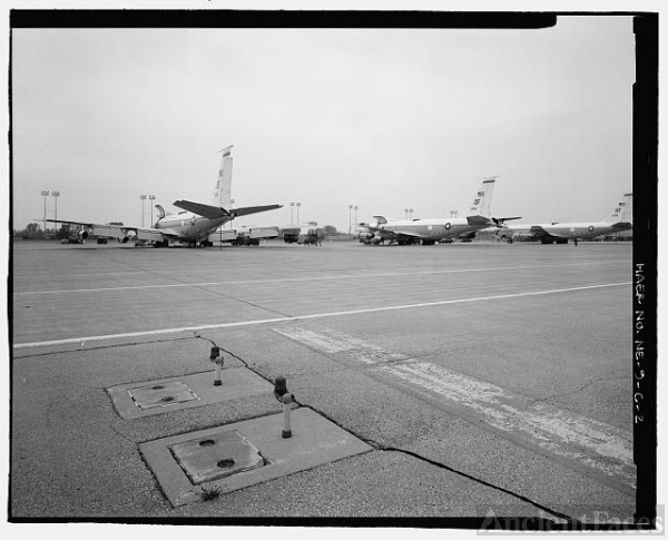 Operational apron with pit hydrants in foreground,...