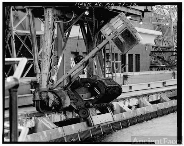 12. VIEW OF TRASH RAKE IN RAISED POSITION AFTER HAVE...