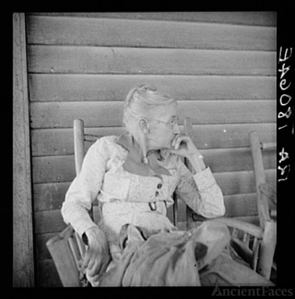 Southern lady of the old school on the veranda of the...