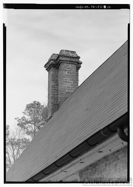 10. Close view of the T-shaped chimney stack on the north...