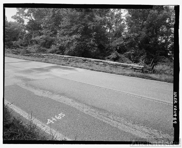 89. VIEW OF STONE GUARD WALL AND ROAD CROSS SECTION ABOVE...