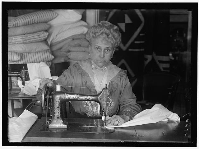 LEGION OF LOYAL WOMEN. MRS. MARY LOGAN TUCKER, SEWING ON...
