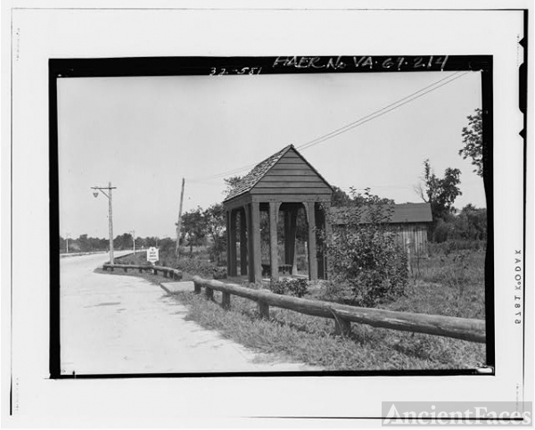 214. RUSTIC BUS SHELTER, GUARDRAILS AND LAMP POST BELLE...