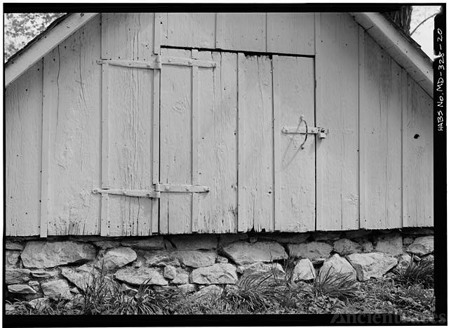 20. DETAIL VIEW OF BOARD-AND-BATTEN PLANKING CONSTRUCTION...