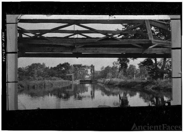 104. A VERTICAL LIFT BRIDGE CARRYING THE MAIN LINE OF THE...