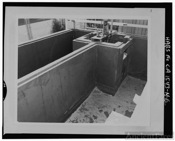 6. Exterior view of acid accumulation vats on east side...