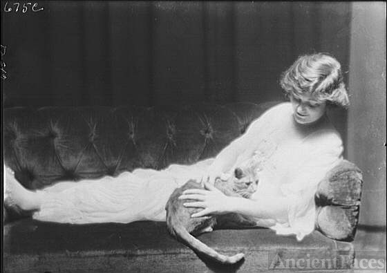 Murdock, Ann, Miss, with Buzzer the cat, portrait photograph