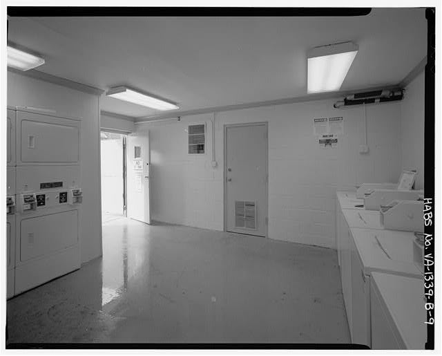 9. Interior view north, interior pool-house: laundry room...