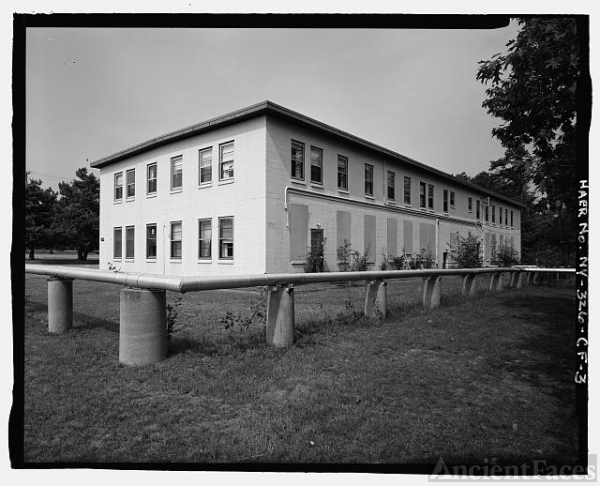 SOUTH (SIDE) AND EAST (REAR) ELEVATIONS OF BUILDING. VIEW...