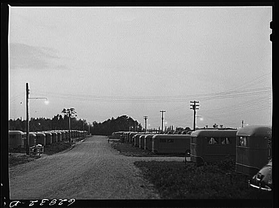 Night view showing street lighting system. FSA (Farm...