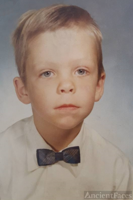 A serious Lawrence as a little boy.