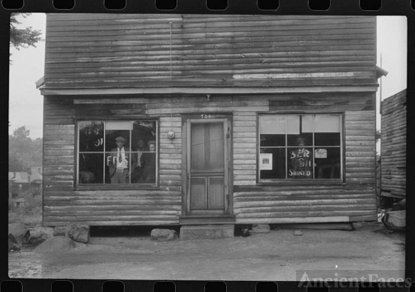 A combination pool room, barbershop, shoe shine parlor...