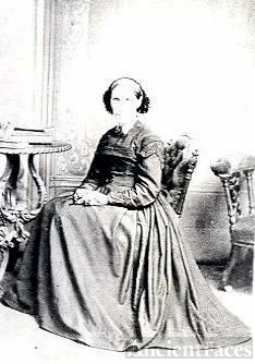 English Matron seated with folded hands