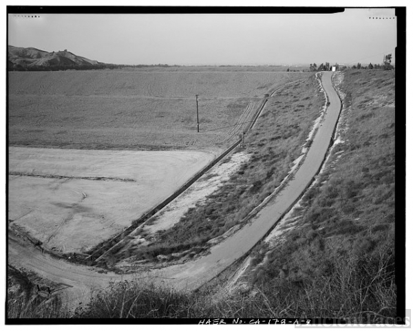 3. DRAINAGE CHANNEL AND ACCESS ROAD AT EAST END OF EARTH...