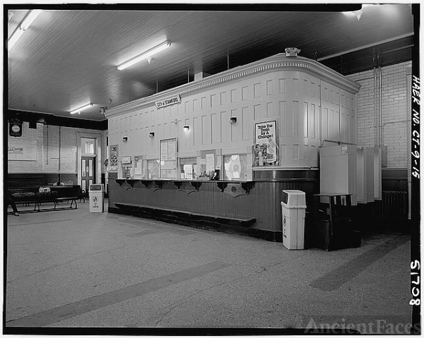 15. 3/4 view of ticketing office inside waiting room of...