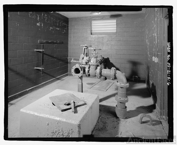 6. Interior view of pipes looking at south wall with...