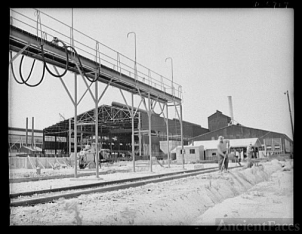 Production. Tin smelting. A new furnace building under...